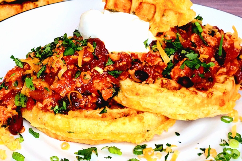 Chicken Chili Over Cheddar Cornbread Waffles | Springer Mountain Farms